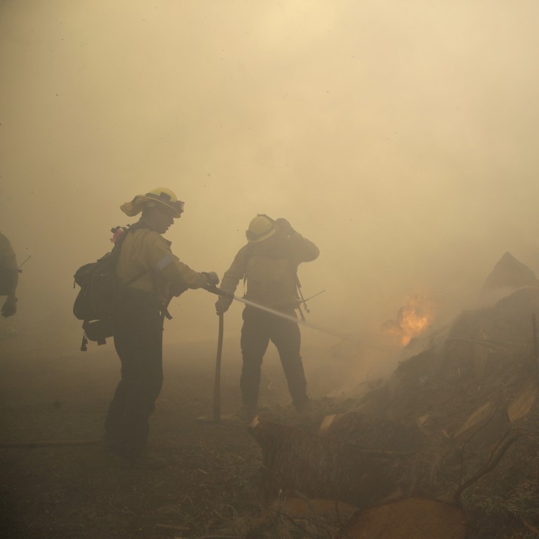 100,000 evacuated as firefighters battle to contain southern California ...