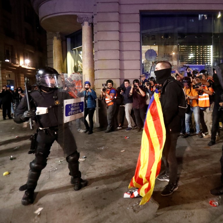Police, protesters clash in Barcelona after 350,000 rally against ...