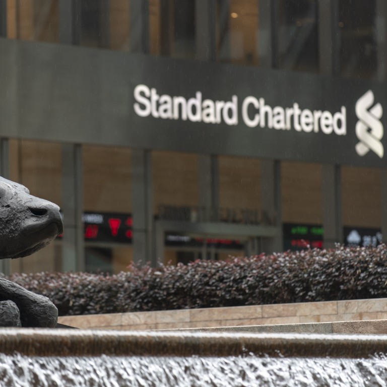 Standard Chartered third-quarter profit beats estimates in stark ...