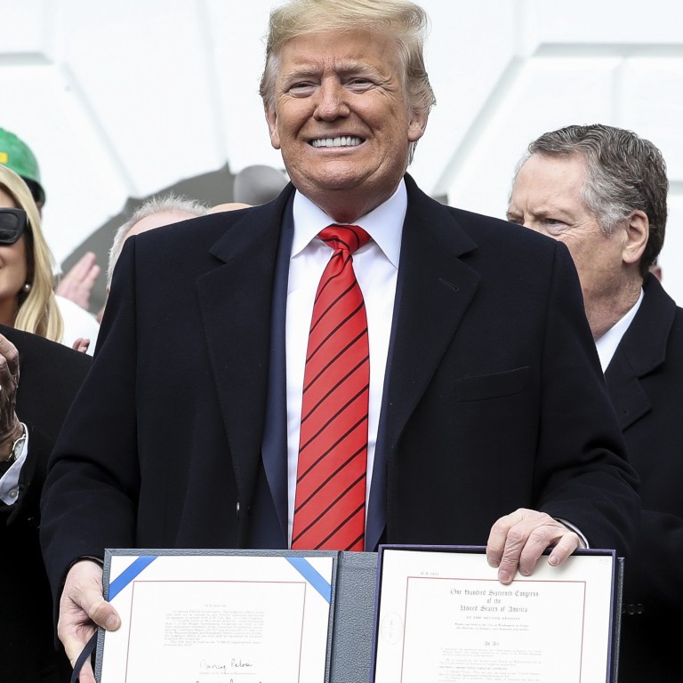 Donald Trump signs trade deal with Canada and Mexico, ‘ending the ...