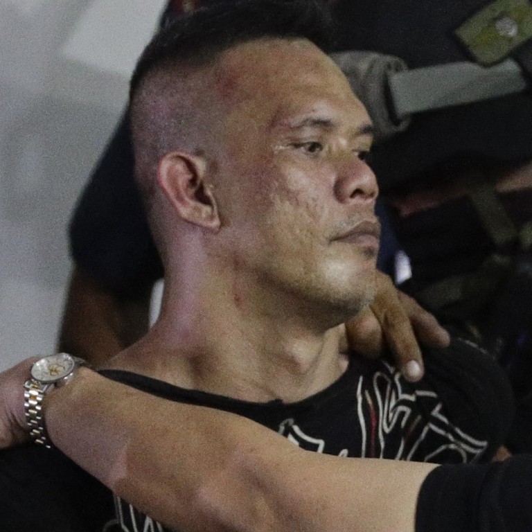 Philippines V-Mall siege ends as ex-security guard surrenders, releases ...