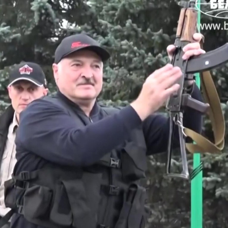 As 100,000 marched in Belarus capital, Lukashenko armed himself with a ...