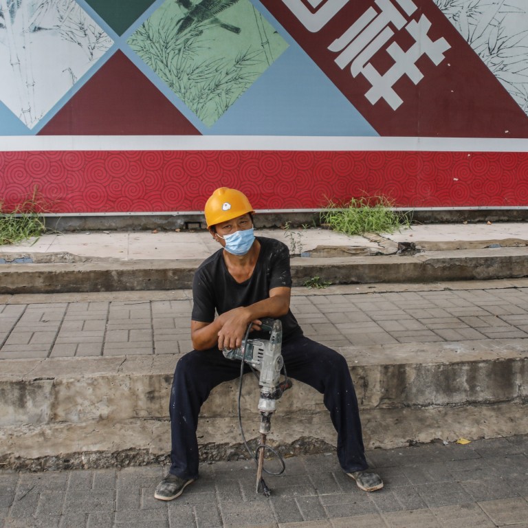 Coronavirus: China’s migrant workers determined to stay in cities as ...