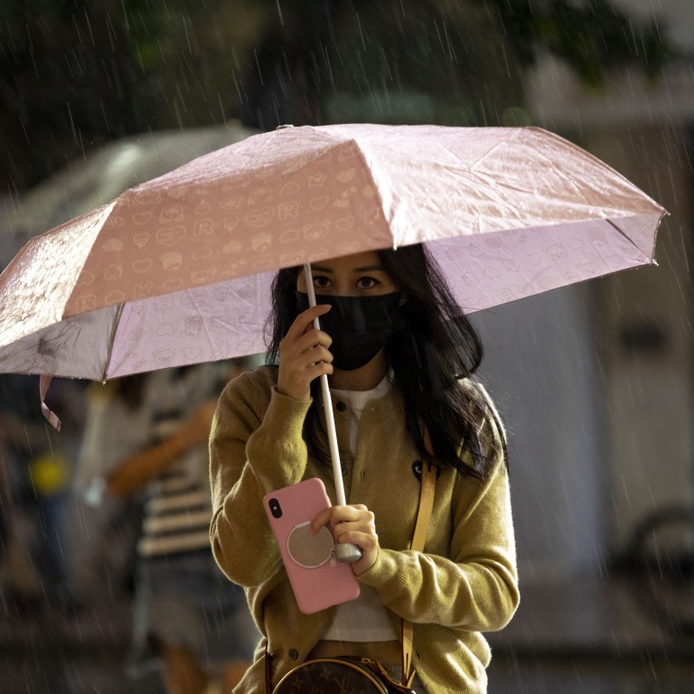 Hong Kong lowers black rainstorm warning, second of the year, to red ...