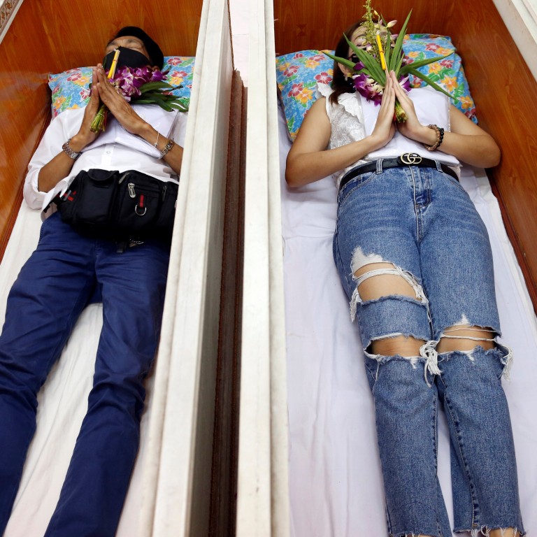 Mock funerals held in Thailand to ‘remember death’, restore fortunes ...