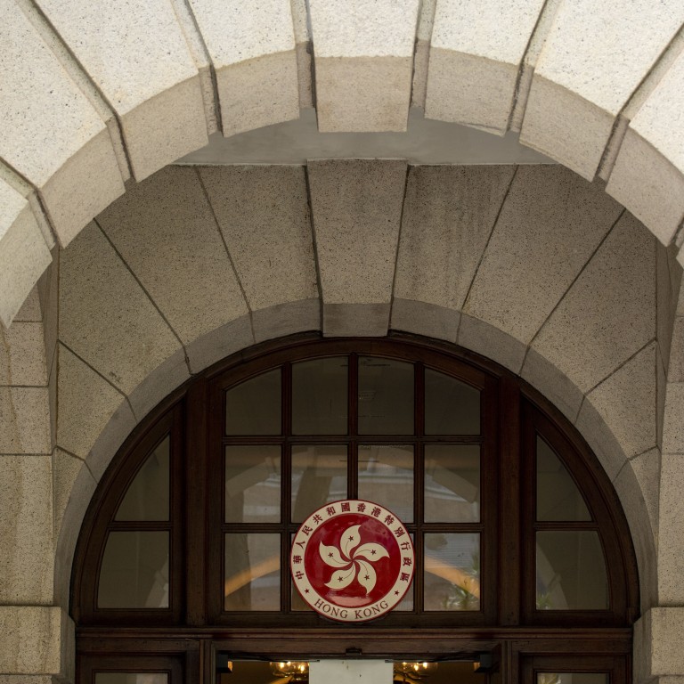 Hong Kong leader accepts recommendation that veteran judge Johnson Lam ...