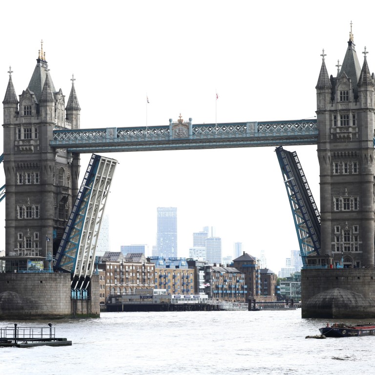 London’s Tower Bridge stuck open after technical failure, causing ...