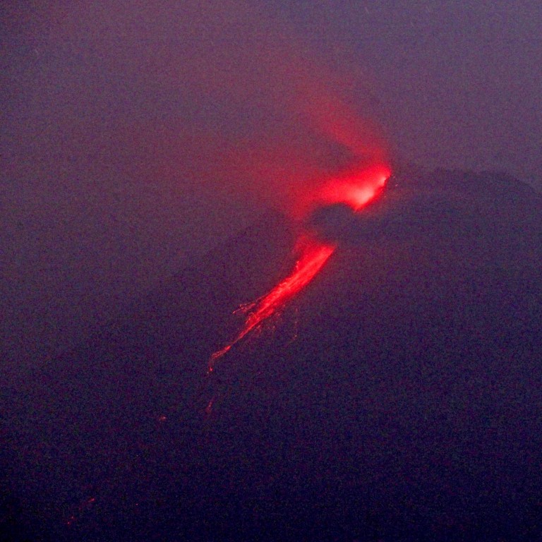 Indonesia volcanic eruption churns out clouds of ash and lava for a ...