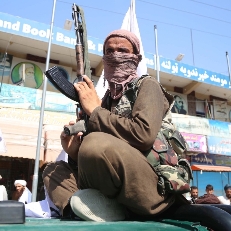 Afghanistan: as Taliban takes over, some swap AK-47s for US-made rifles ...