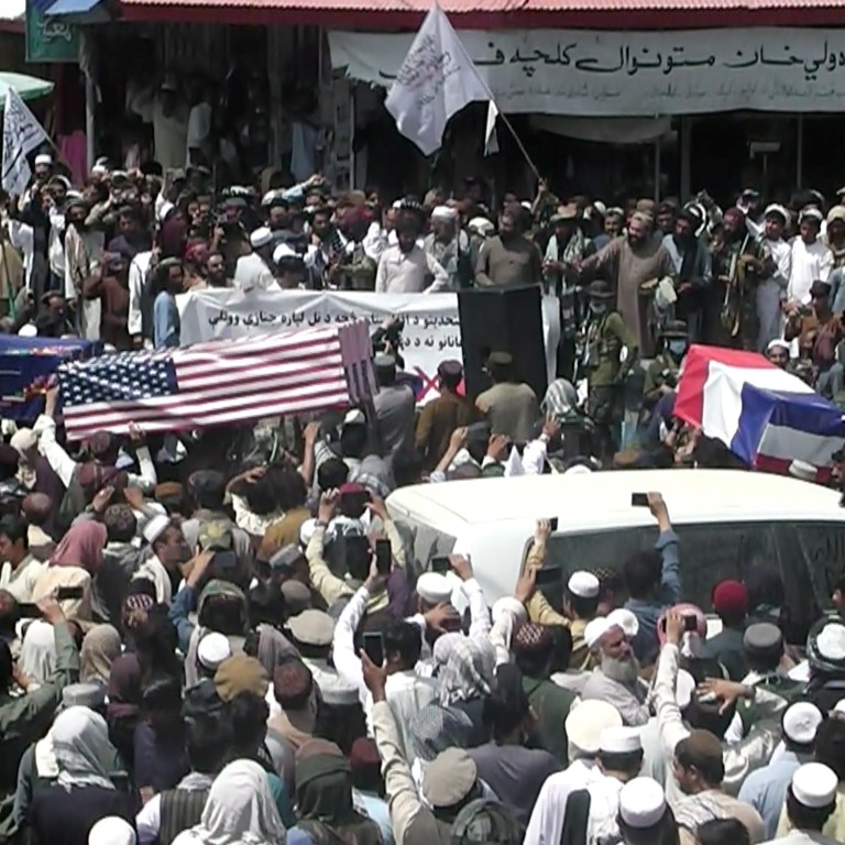 Afghanistan: Taliban supporters hold mock funeral with coffins draped ...