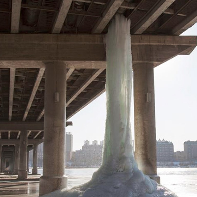 Big freeze: dripping pipe creates huge ice pillar in China’s frozen ...