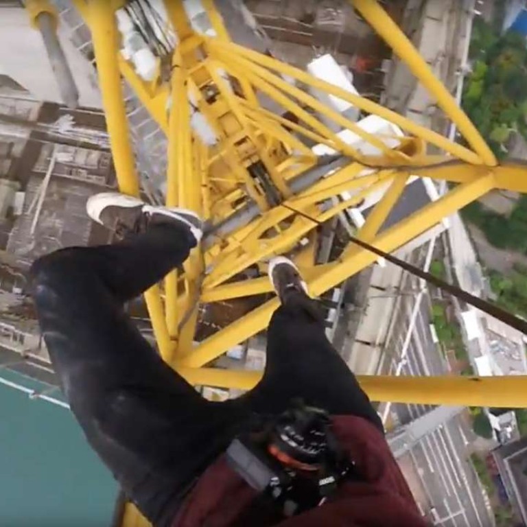 Hong Kong daredevil climbs to top of high-rises for thrills, and ...