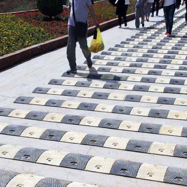 Chinese tourist attraction installs speed bumps ... for pedestrians ...