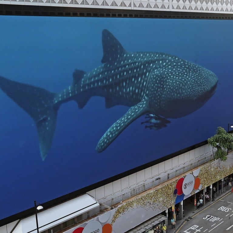 Heavy on light? Hong Kong LED screen size of five tennis courts sparks ...
