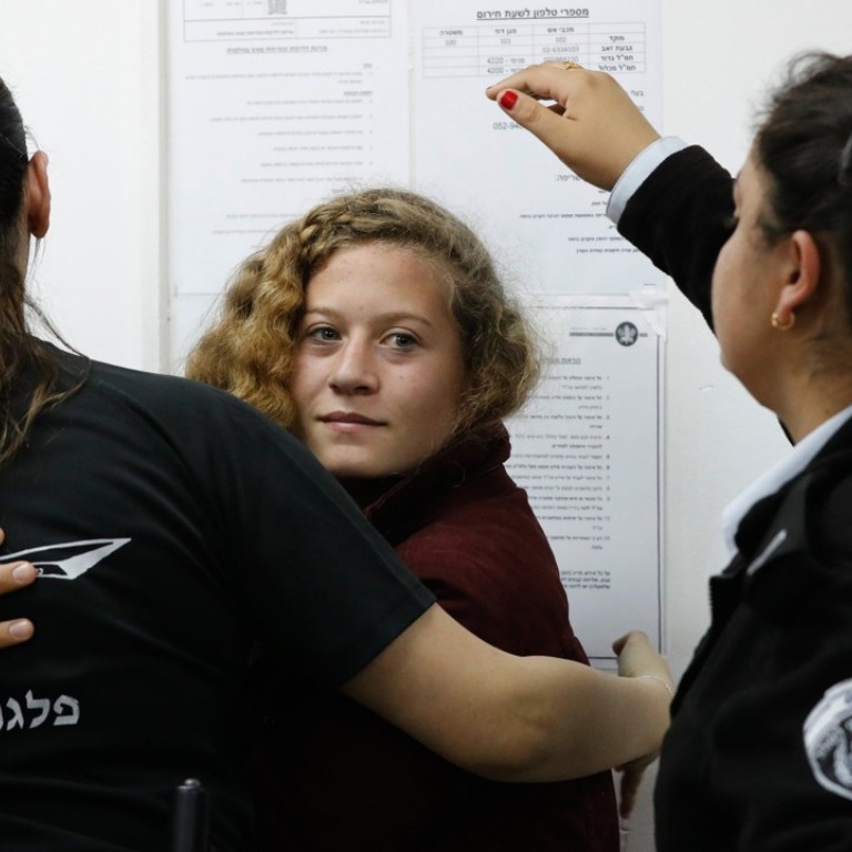 Israel Extends Detention Of Palestinian Teenager Seen Slapping Soldiers