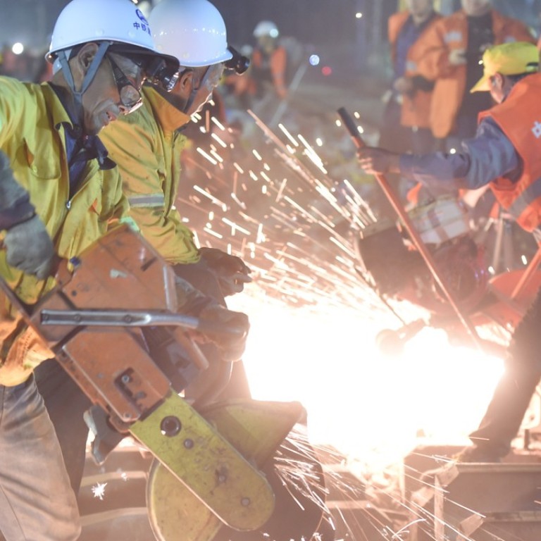 Fast rail: watch 1,500 Chinese workers build train station track in 9 ...
