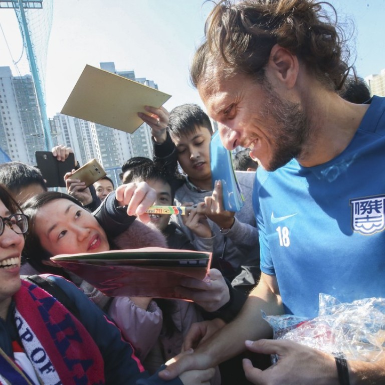 Diego Forlan leaves his legacy at Kitchee as final Hong Kong Premier ...