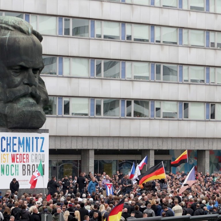 Thousands protest for and against migrants in tense German town | South ...