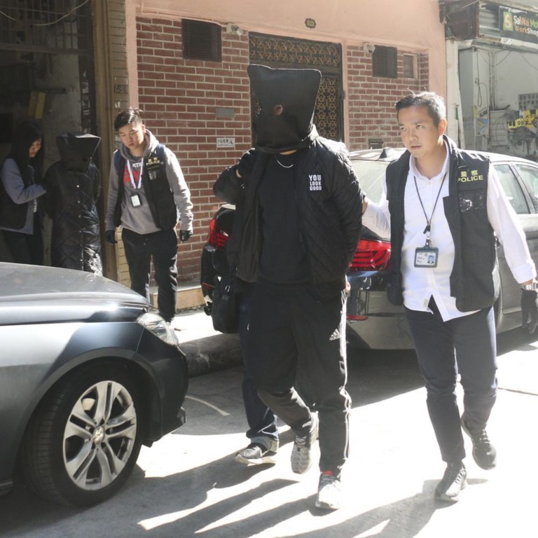 Suspected Hong Kong Triad Member And Girlfriend Held After Police Seize