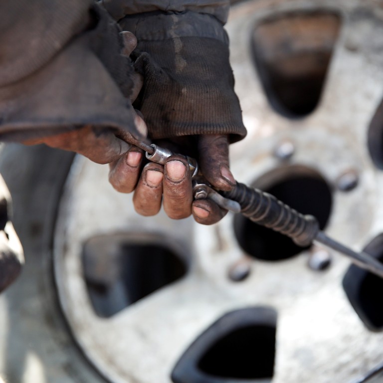 Hong Kong man dies after truck tyre he was inflating explodes | South ...