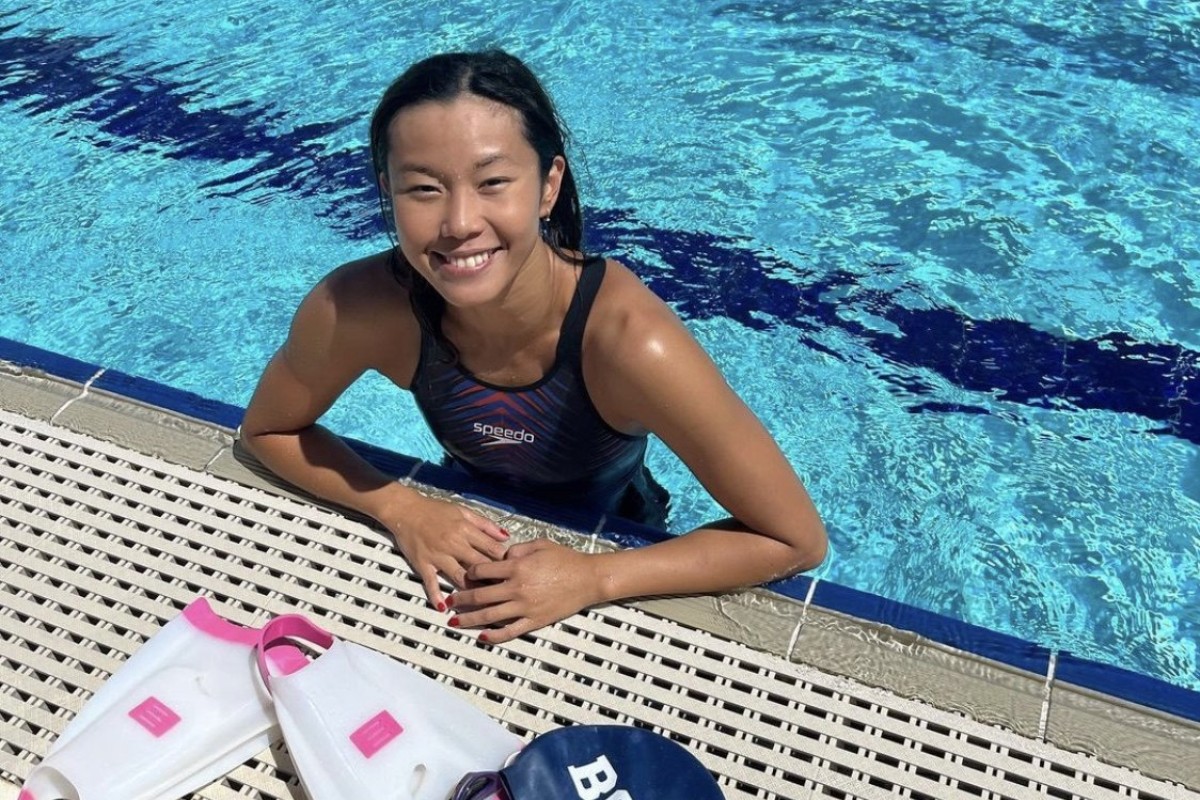 Swimmer and four-time Olympian Stephanie Au finishes her last race in ...