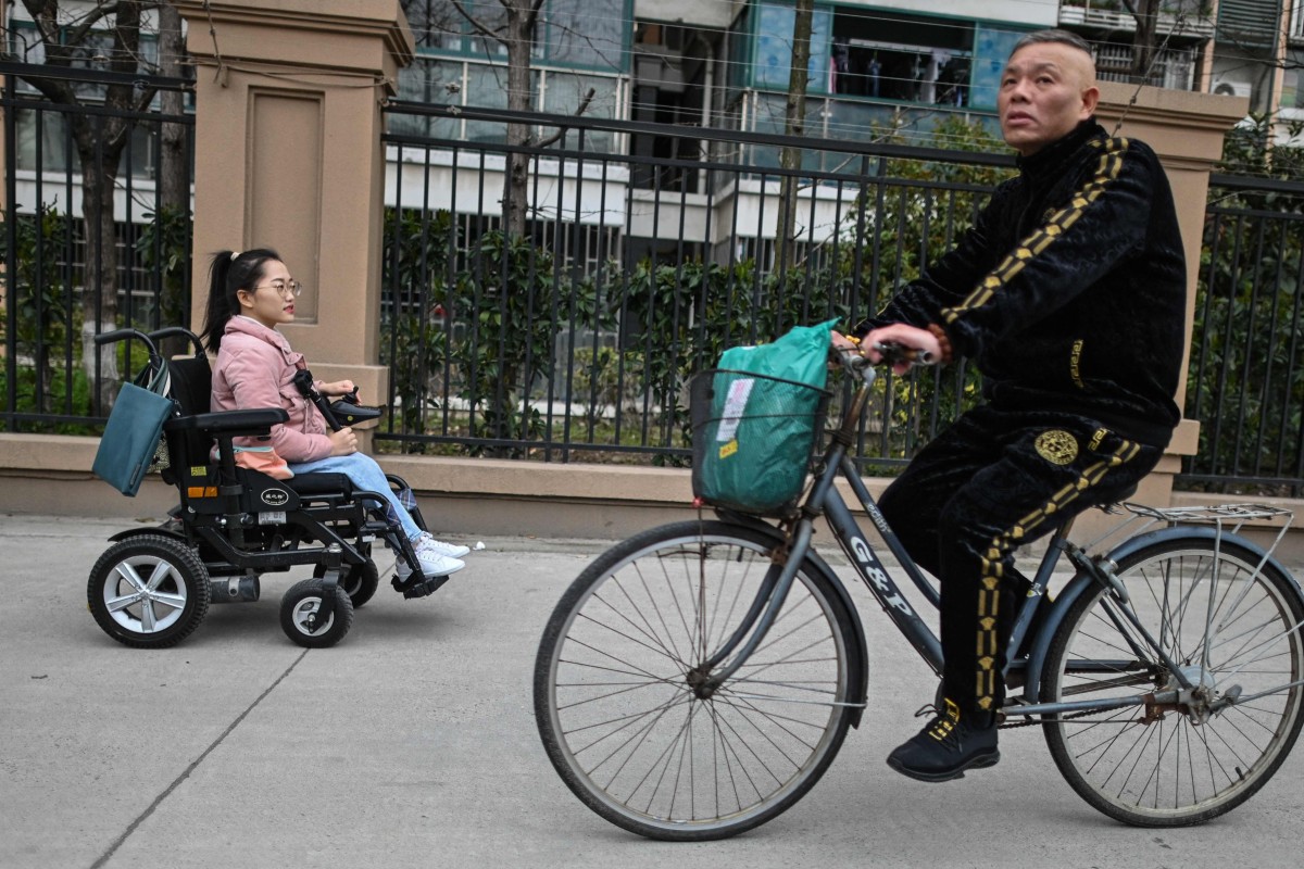 Wheelchair users in Shanghai discuss the challenges they face and call ...