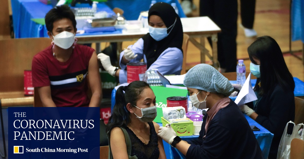 Coronavirus: Singapore delays easing of curbs as cases surge ...