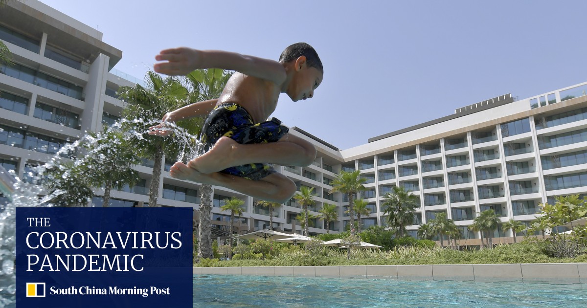 Temperature checks, nasal swabs, plenty of beach: Dubai tourism ...