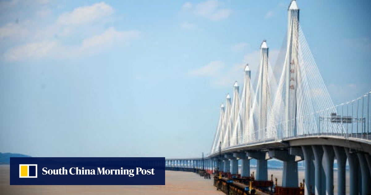 World's longest cable-stayed bridge opens in China | South China ...