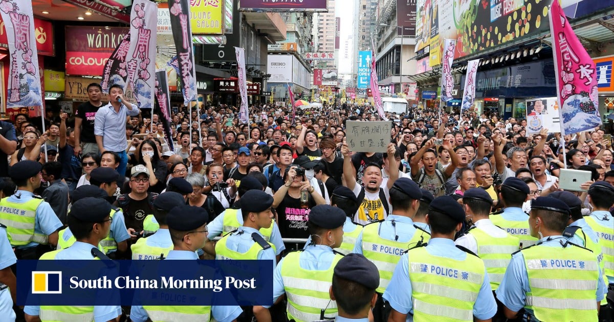 Pro-police protesters clash with rival group in rally sparked by ...