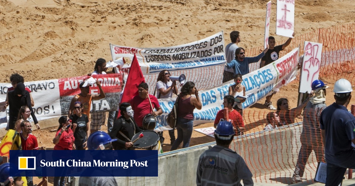 Protesters disrupt Fifa visit to stadium in Brazil | South China ...