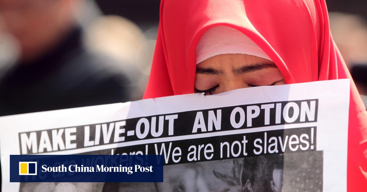 Protesters march against maids' live-in rule | South China Morning Post