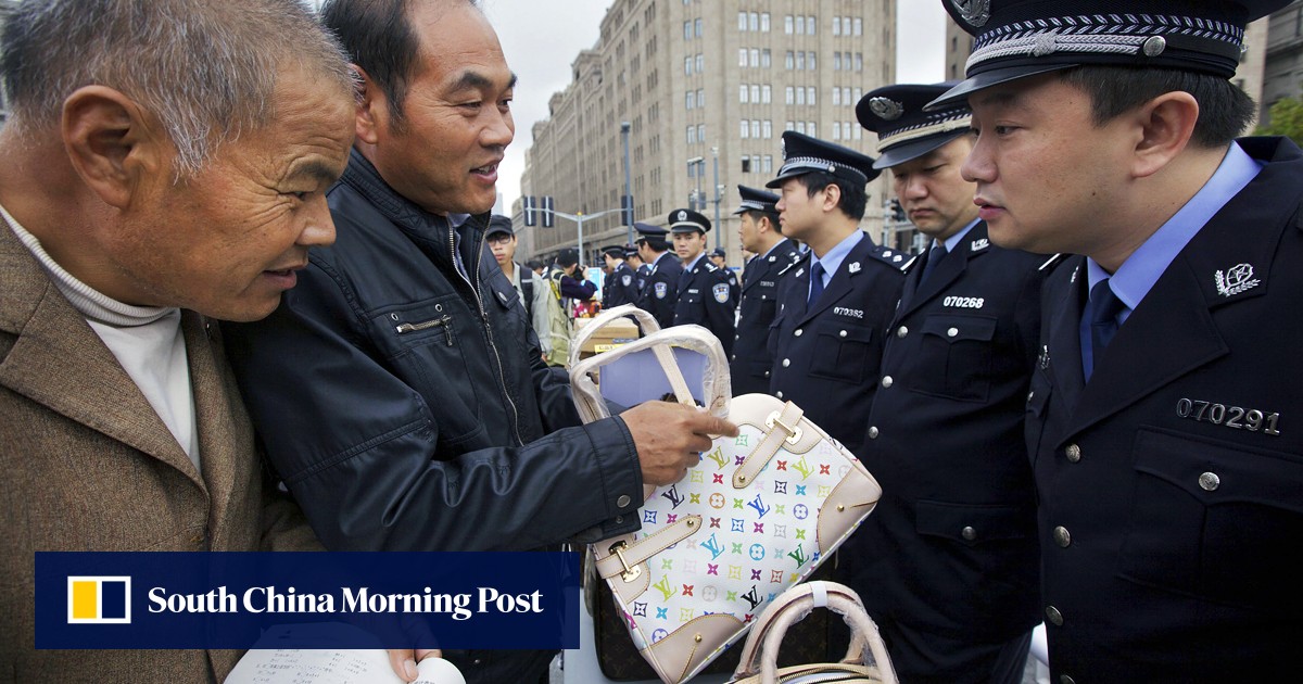 Young Chinese couple accused of selling fake luxury handbags worth ...