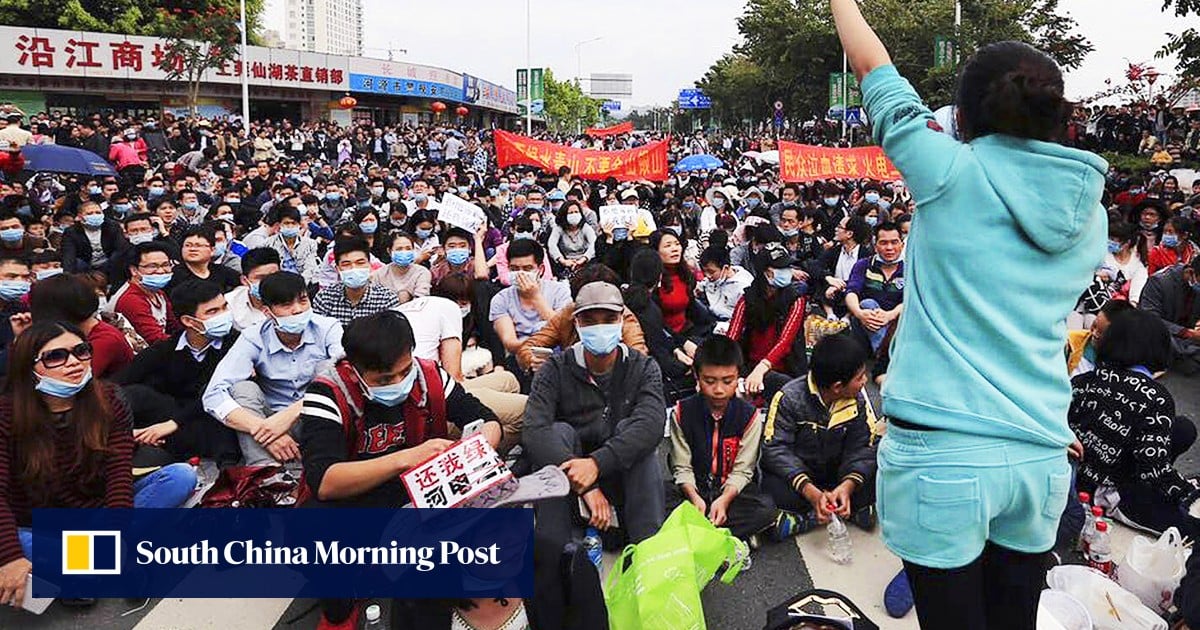 10,000 protest in Chinese city over planned coal-fired power plant ...