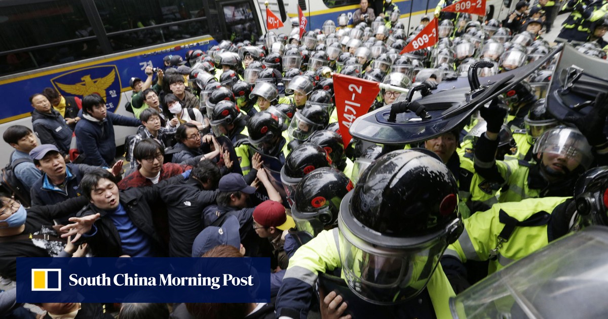 'Salvage the Sewol ferry': Police use water cannons as hundreds clash ...