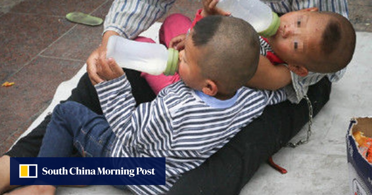 Ill beggar in China chains twin sons to himself | South China Morning Post