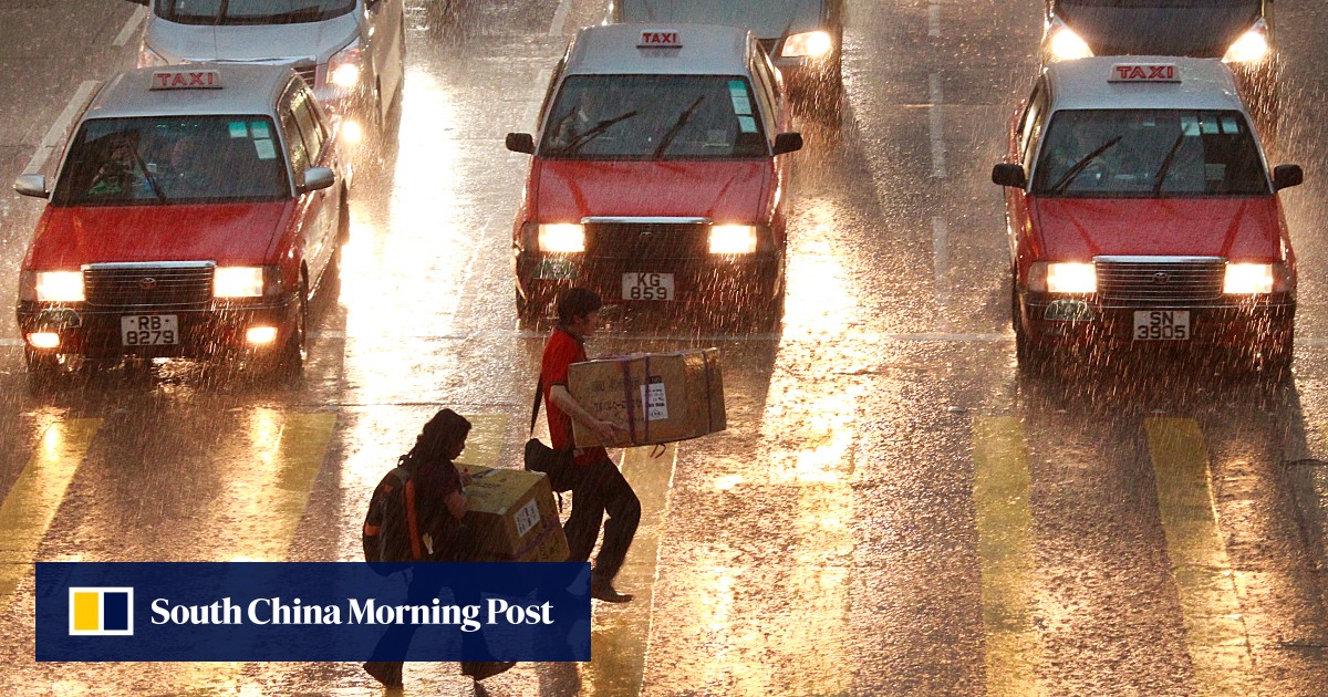 IN PICTURES: Umbrellas up! Scenes from Hong Kong streets during first ...