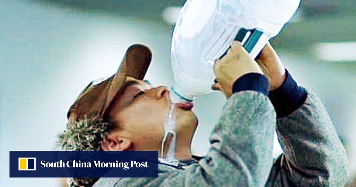 Gan bei! Chinese woman chugs US$200 bottle of cognac at baggage check ...