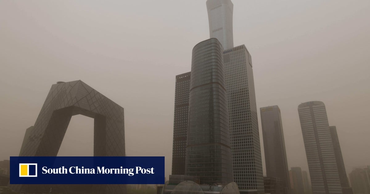 Beijing skies turn yellow under cloud of sand, dust | South China ...