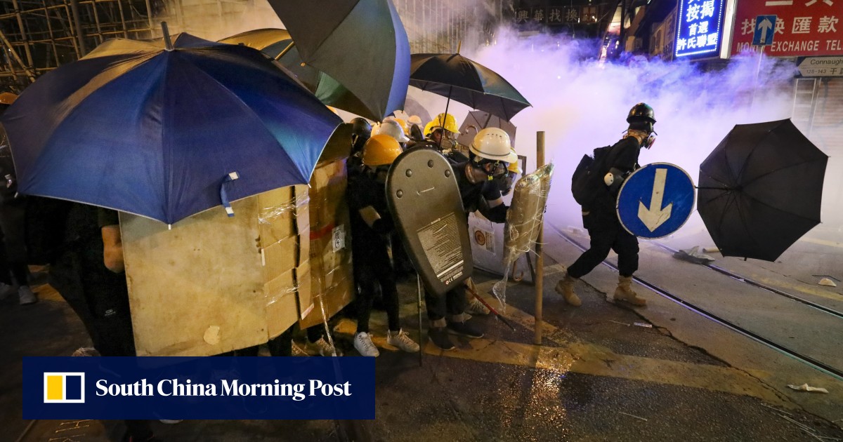 14 protesters found guilty of rioting near Beijing’s liaison office in ...