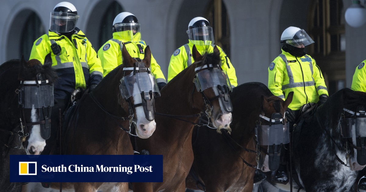 Canadian police in riot gear clear main protest hub in Ottawa as ...