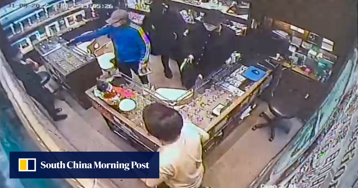 CCTV footage shows 4 armed robbers hold up store in Hong Kong at ...