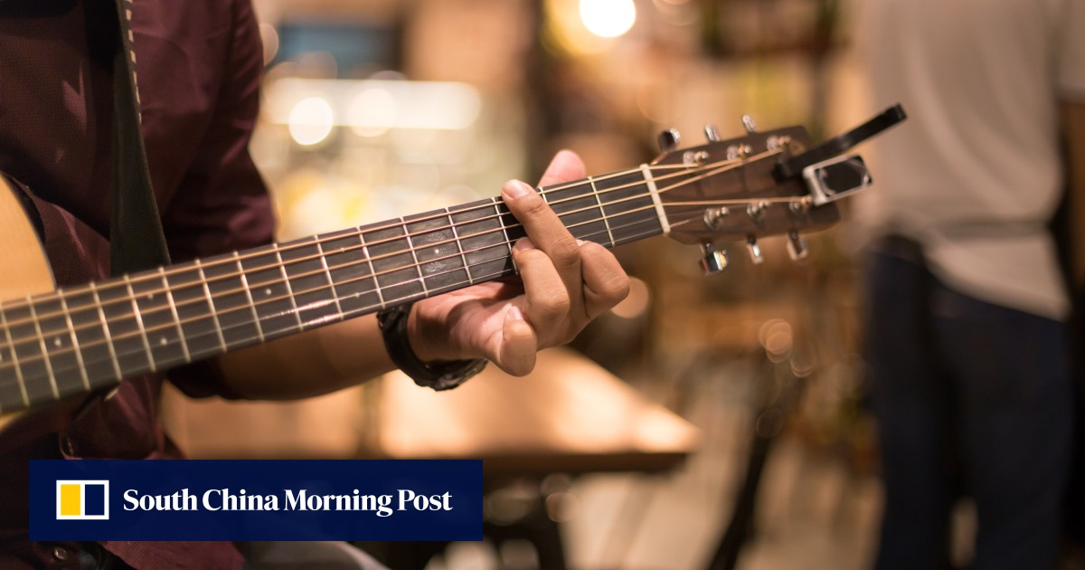 From microphones to mobile phones: Hong Kong singer’s struggle to ...