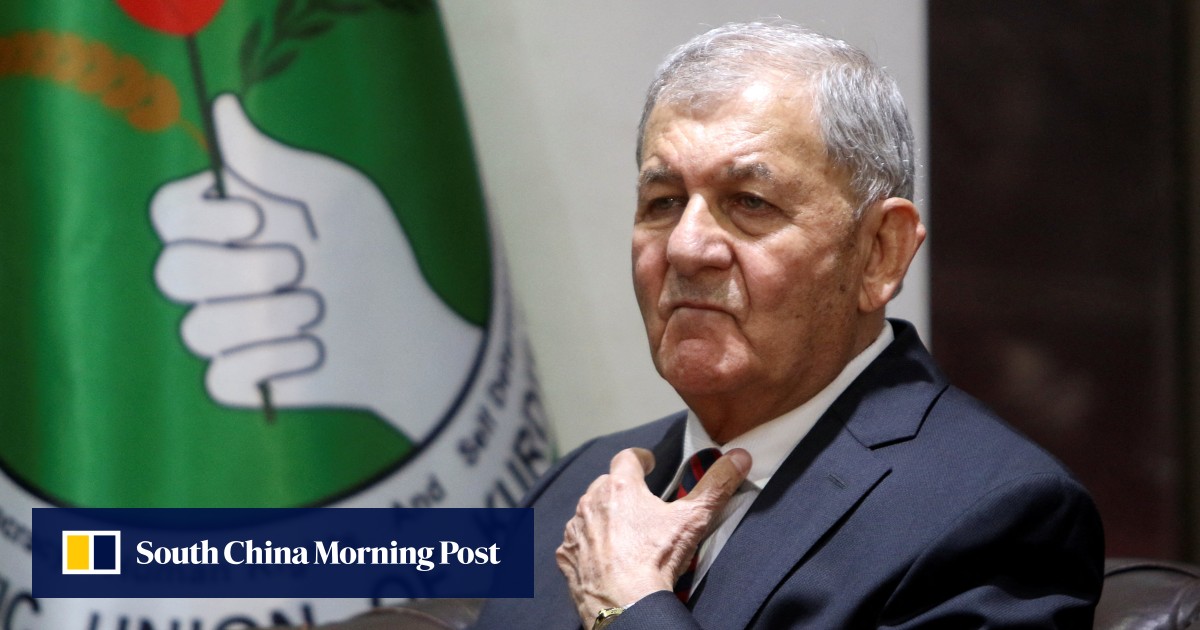 Braving rockets, Iraq MPs elect president who names PM after year of ...