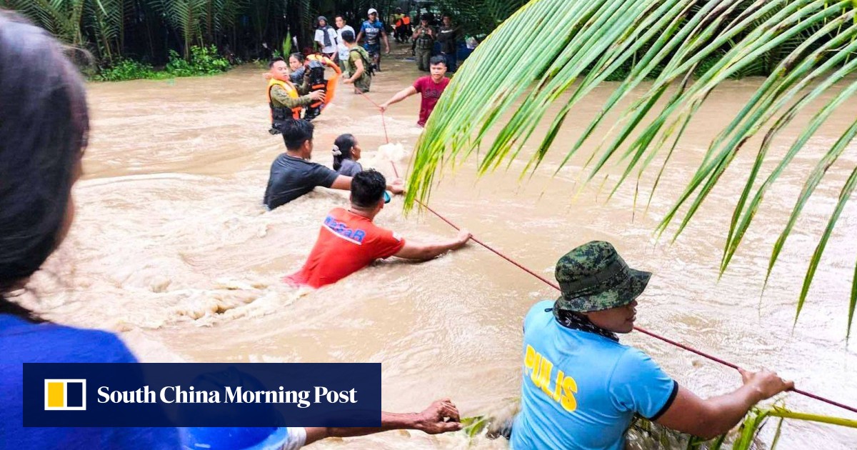 At least 50 dead as Tropical Storm Nalgae lashes Philippines, dozens ...