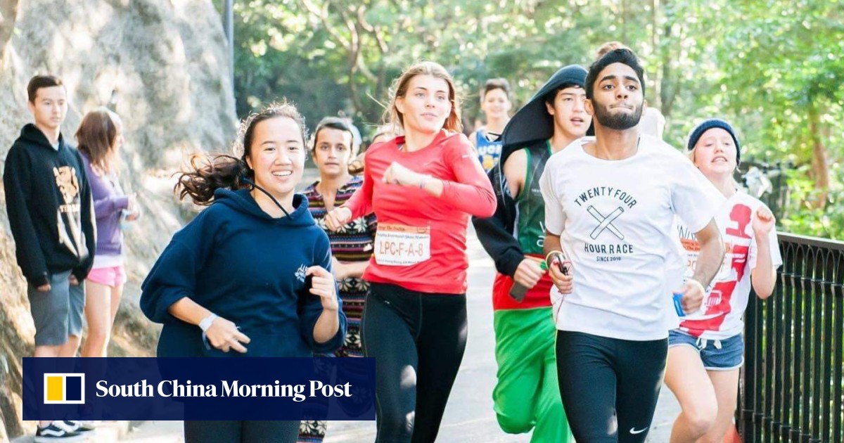 Hong Kong students run round 400m track for 12 hours, raising money for ...