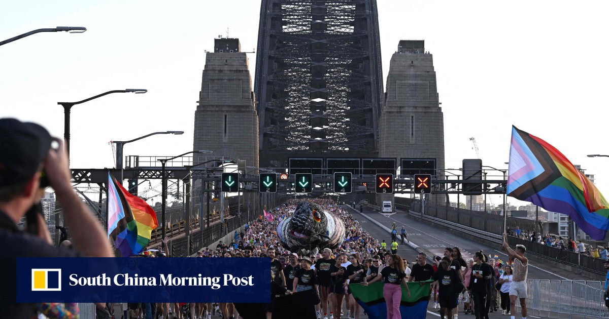 50,000 march across Australia’s Harbour Bridge for WorldPride festival ...