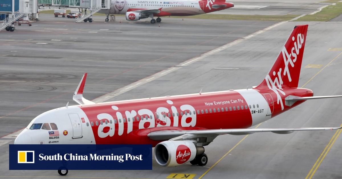 AirAsia flight attendant on Cambodia plane enthralls passengers with ...