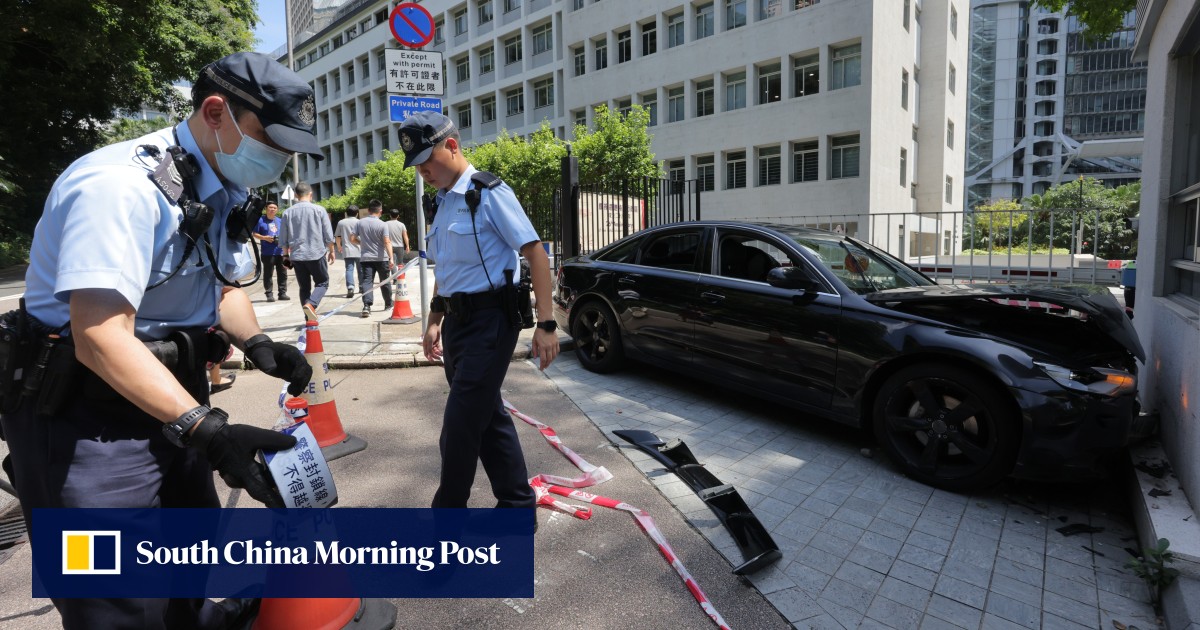 Hong Kong Police Launch Investigation After Car Slams Into Security