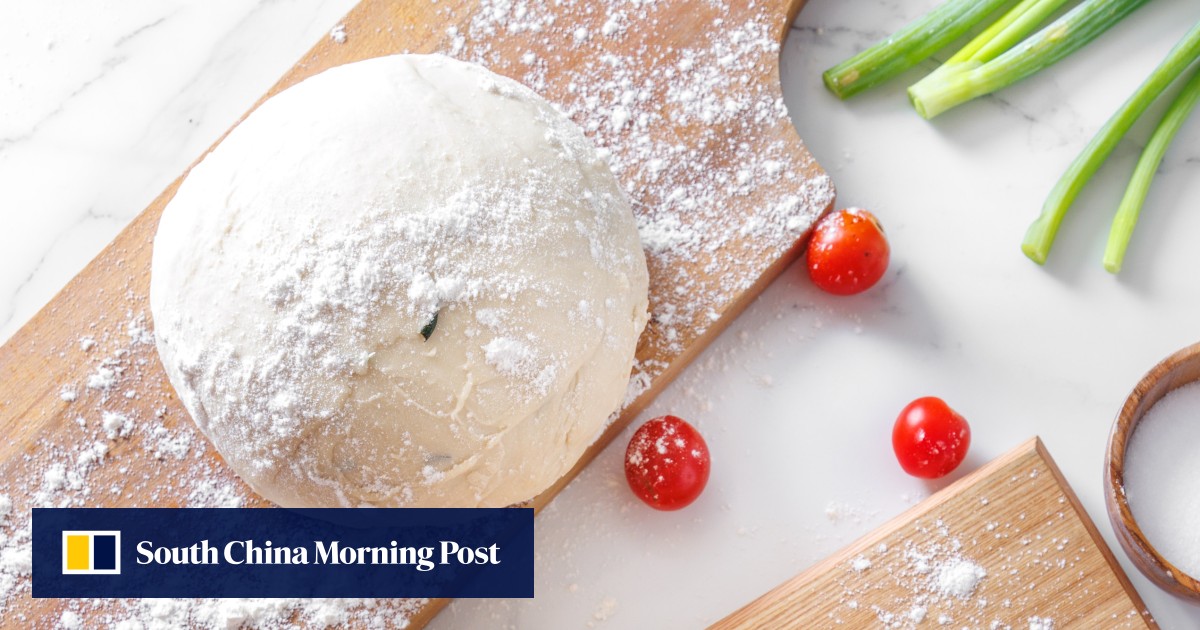 Blindfolded and relying on sound, touch and smell to make Italian bread ...